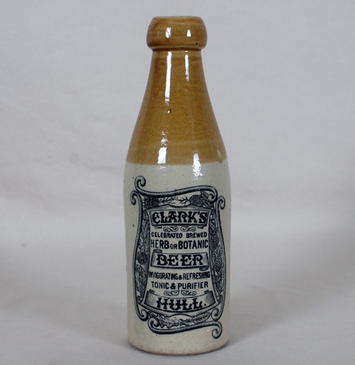 Clark's Herb Botanic Stoneware Beer Bottle at Breweriana.com